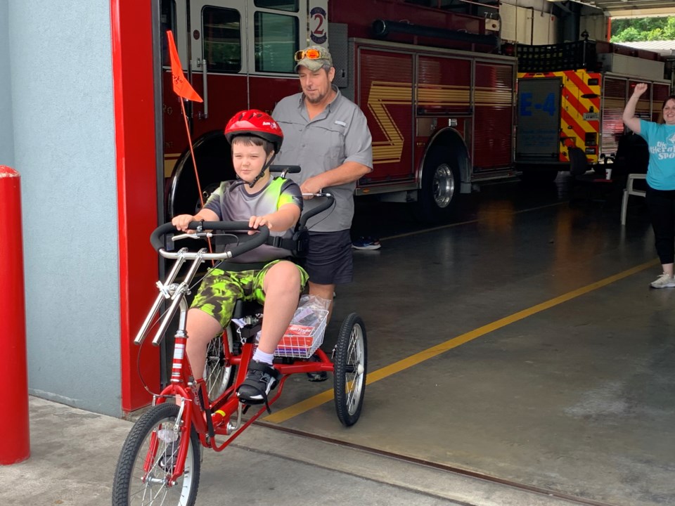 Six-Year-Old Maverick McKinney Receives Amtryke Adaptive Tricycle ...